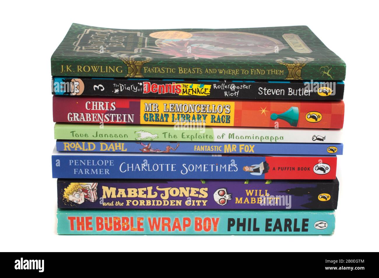 A pile of children's books photographed against a white background ...