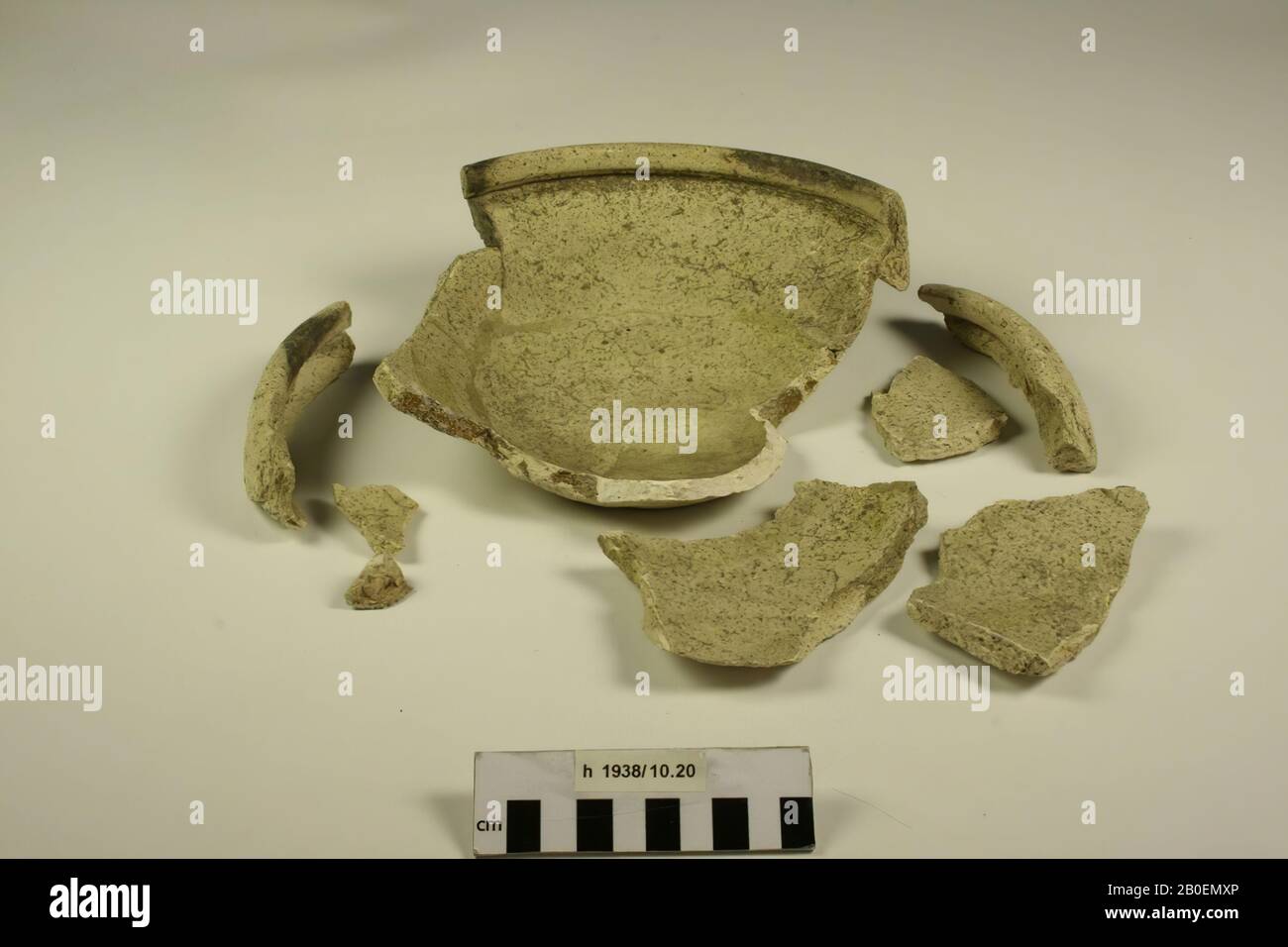 Scale with standing edge. Damaged, old glueing and additions, which ...