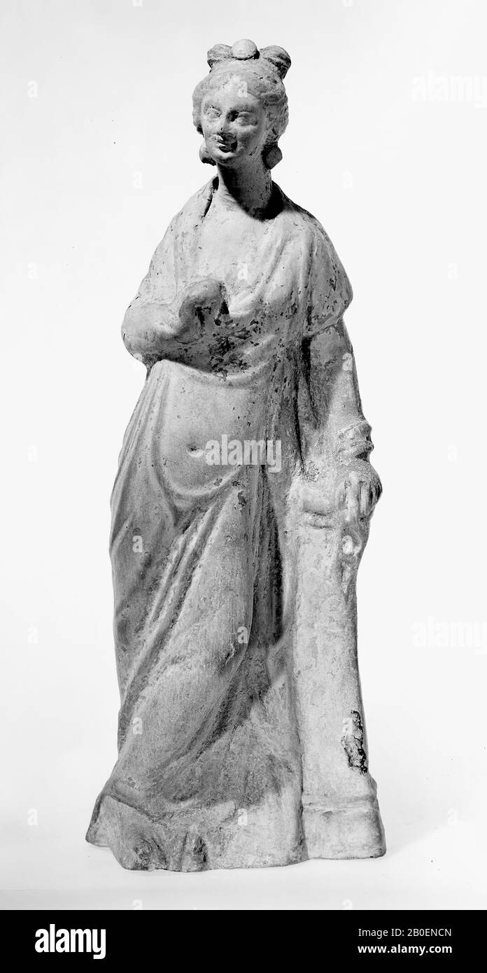 Terracotta sculpture of a woman in himation, leaning on a column ...