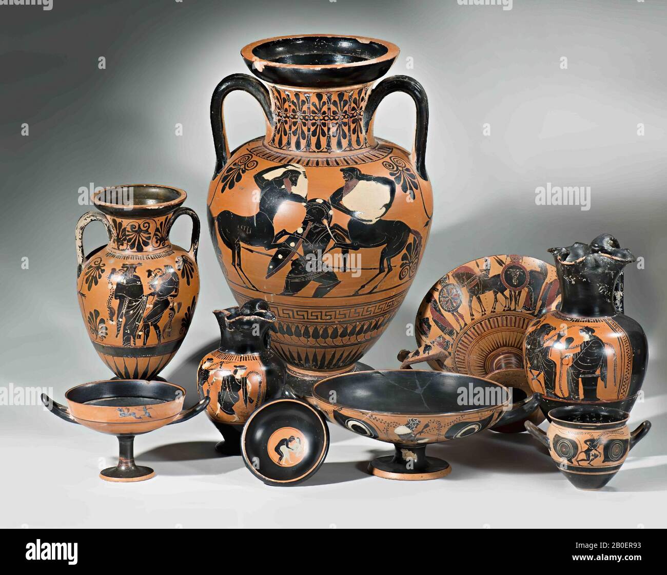 Attic black-figure mastoid. Decoration of satyr in between apotropaeic ...