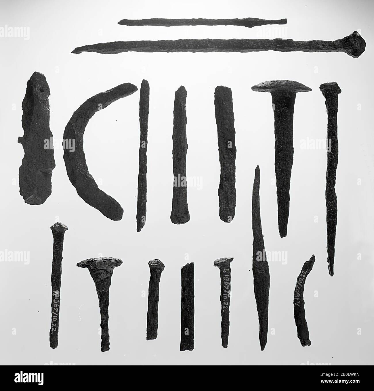 16 objects of which 7 nails and 9 parts of nails (?), nail, metal, iron ...