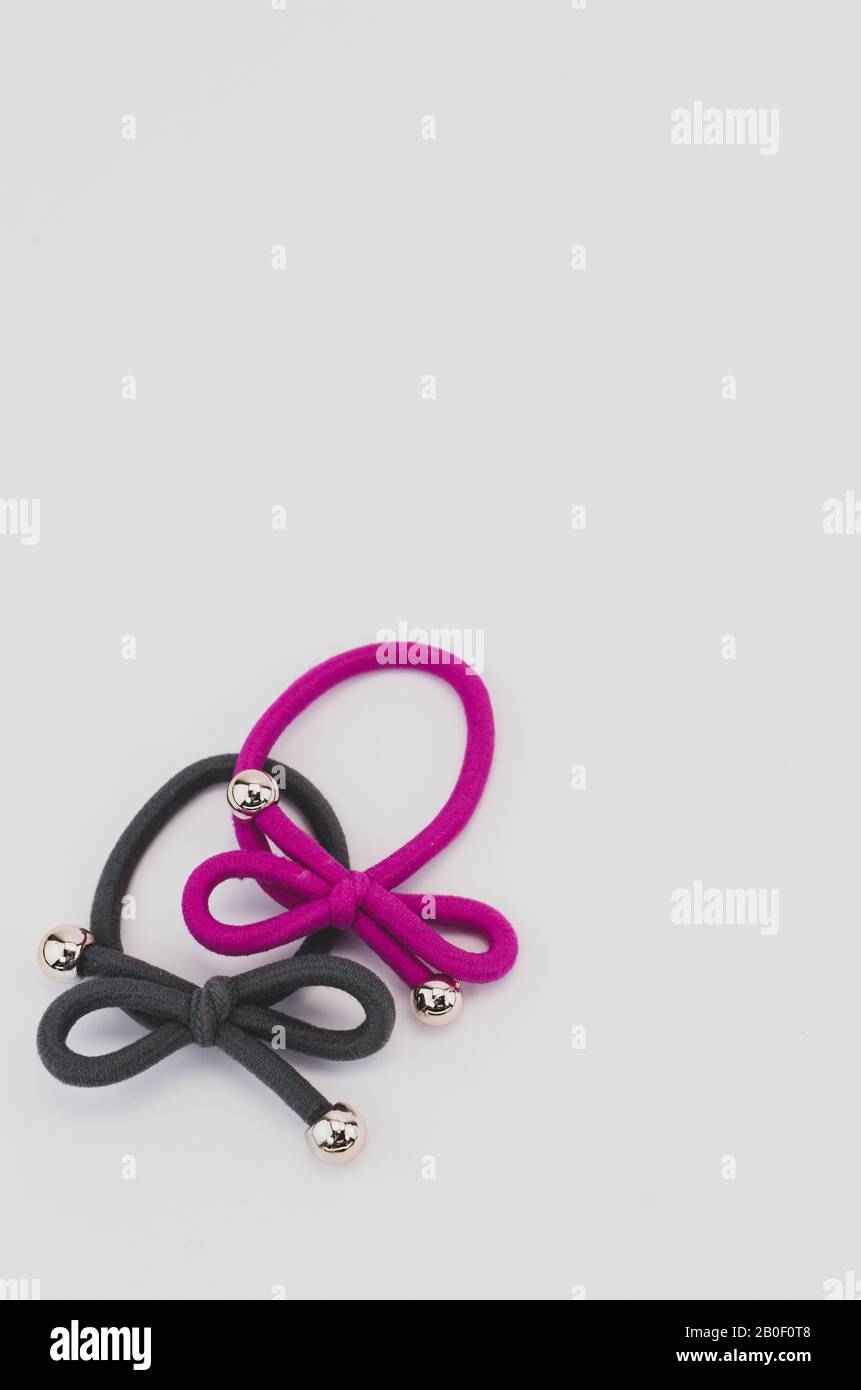 colored hair bands with decorations on a white background Stock Photo ...