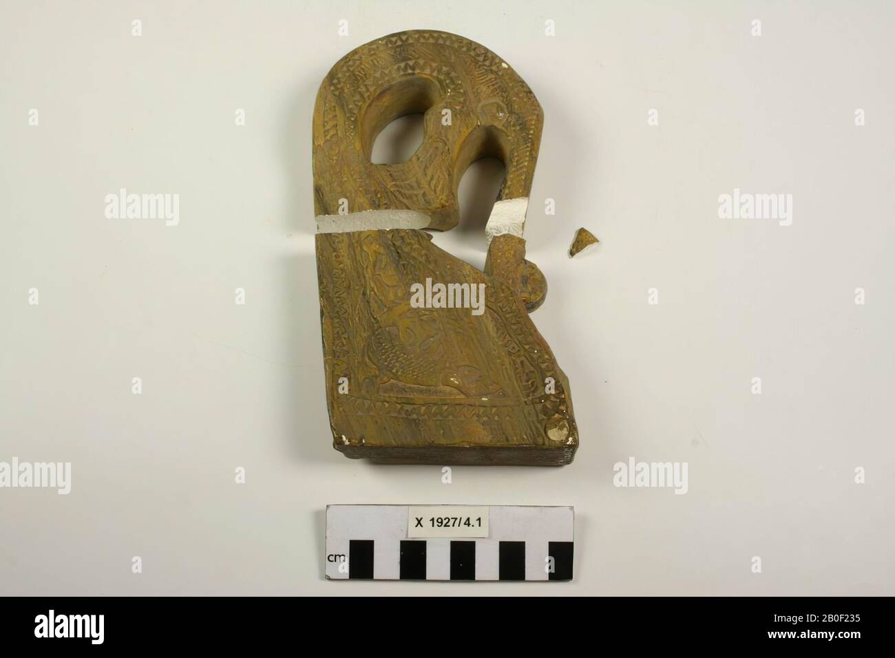 Plaster cast of a bed base fragment: the end of the frames of a wooden ...