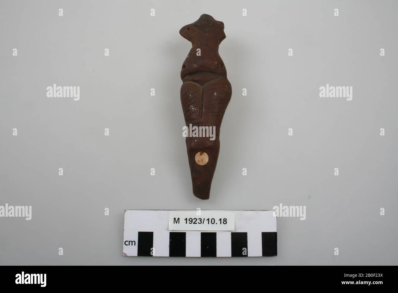 Plaster cast of a small idol. Hips and shoulders pierced., Casting ...