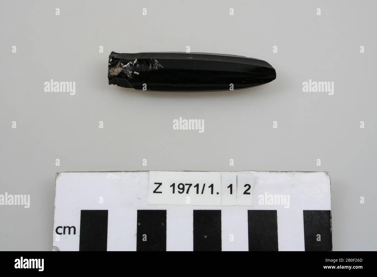 Apparatus of obsidian, rod-shaped and 11-angled., Tool, stone, obsidian ...