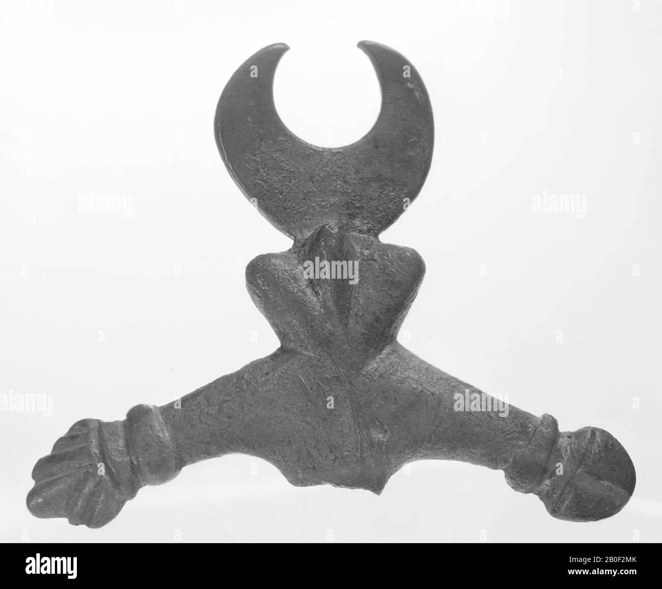 Bronze phallus amulet. Hanger, possibly meant for harness. On the right ...