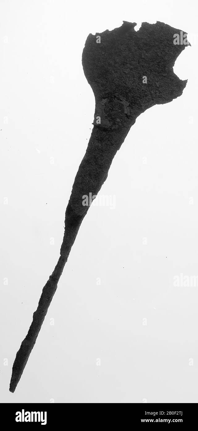 Iron tool, handle with spoon-shaped end, but partly broken off ...