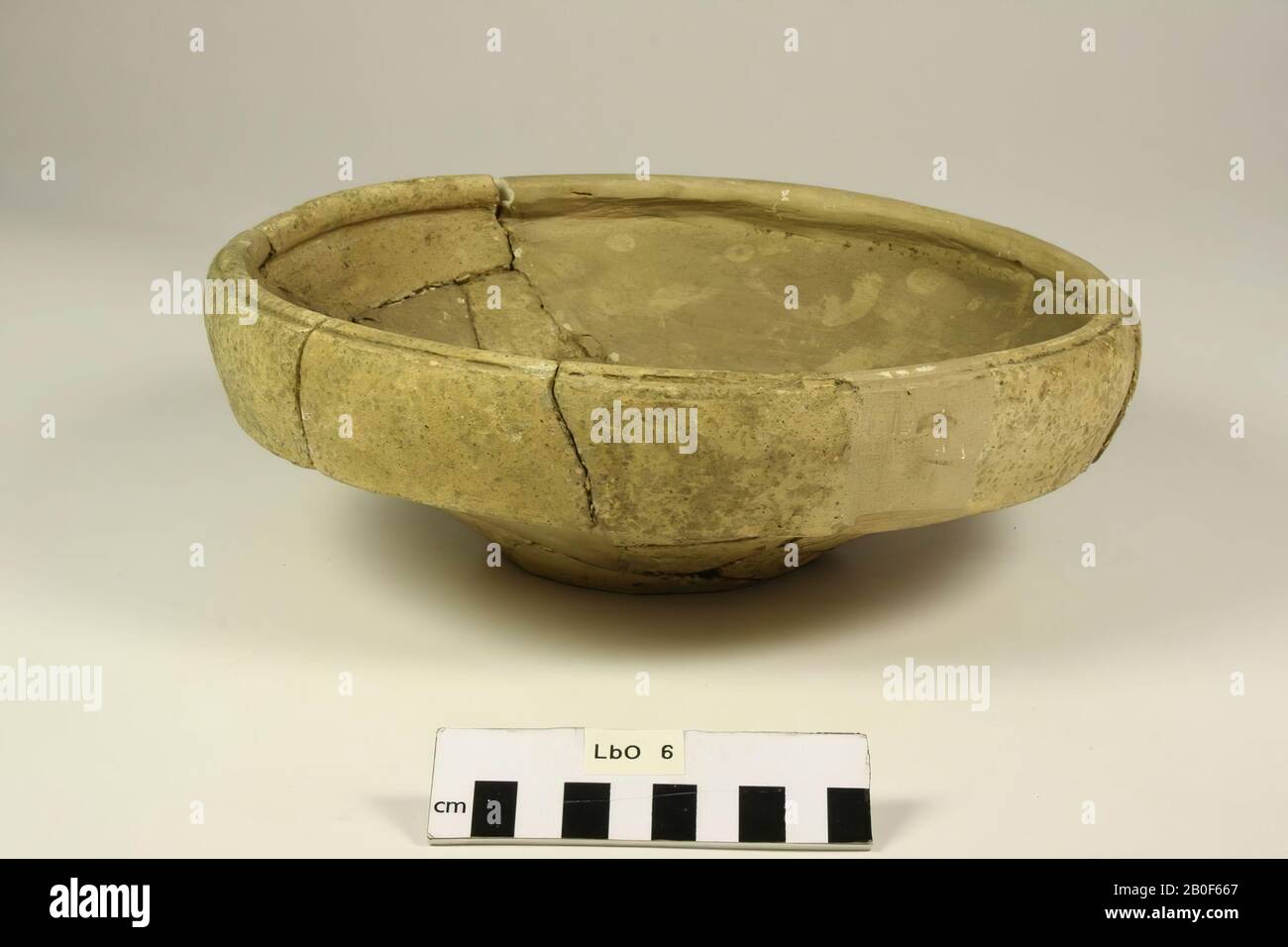 Scraper of thick-walled coarse pottery with vertical edge. Deer ...