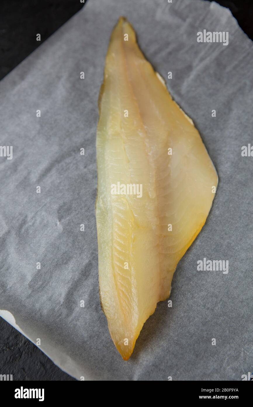 A smoked, undyed haddock fillet, Melanogrammus aeglefinus, bought from ...