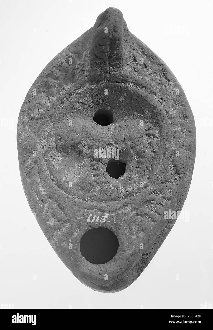 A red-nested light with an ovoid body. The round, hollow mirror is ...