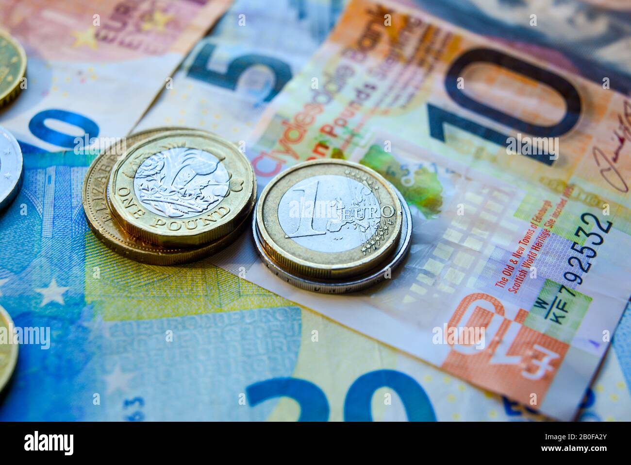 Euro and Pound coins and banknotes Stock Photo - Alamy