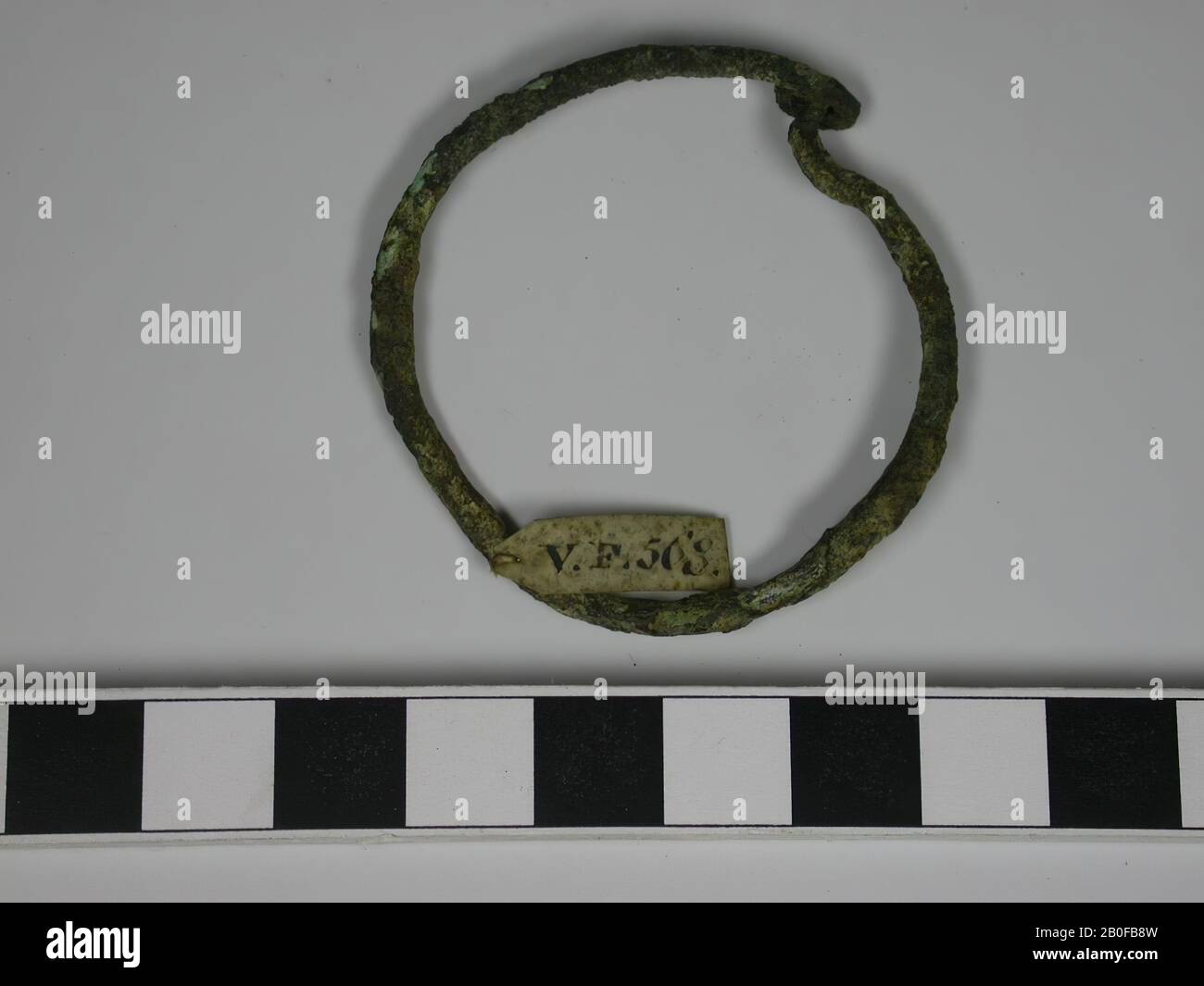 Bronze bracelet of wire work. The ends are bent into hooks., Bracelet ...