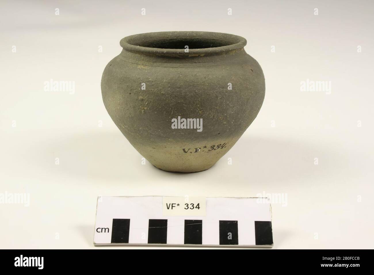 Pot with high foot. The belly narrowing from the bottom to the top, and ...