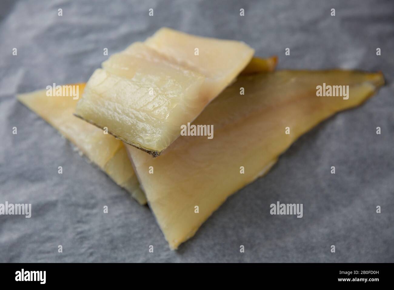 A smoked, undyed haddock fillet, Melanogrammus aeglefinus, bought from ...