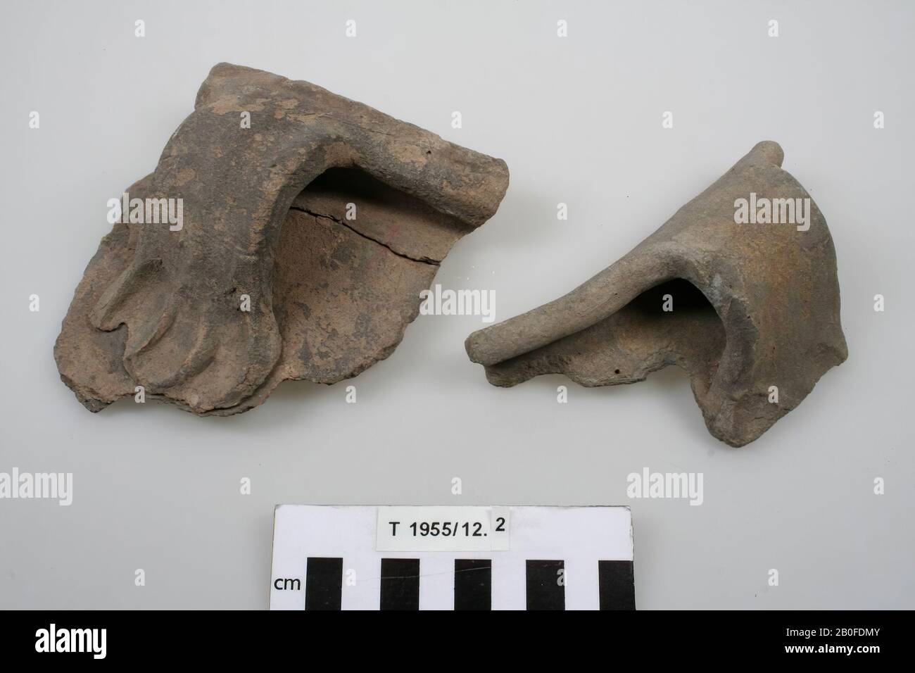 2 Fragments: shards with ear and part wall, 1 of which has an old ...