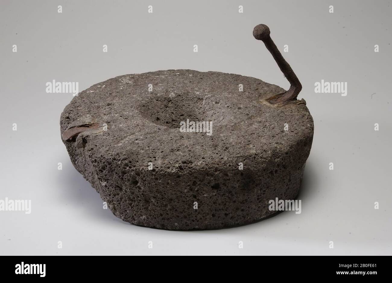 Grindstone of tefrite with iron handle for turning, grinding stone ...