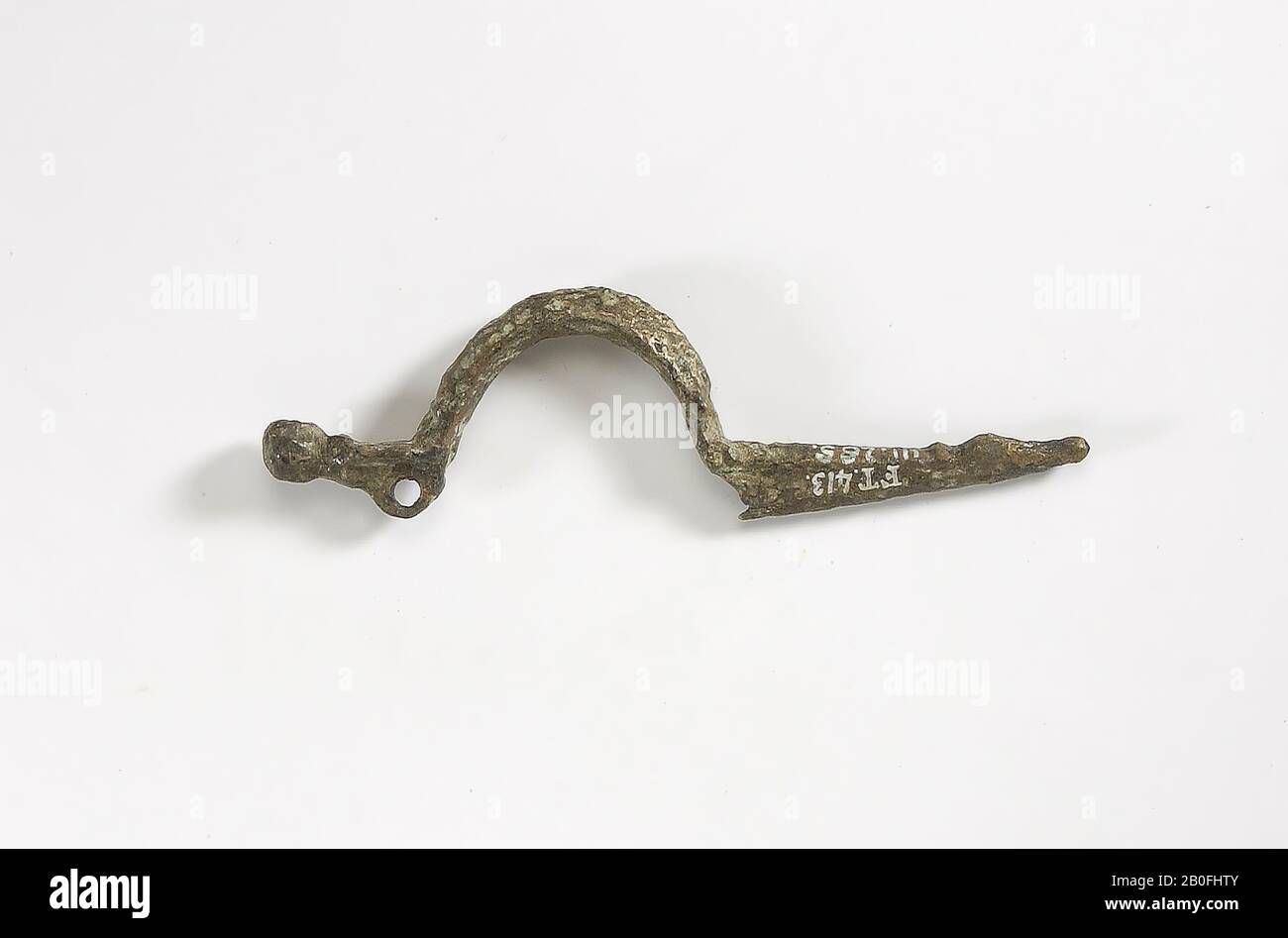 Bronze arch fibula. The needle is missing., Fibula, arch fibula, metal ...
