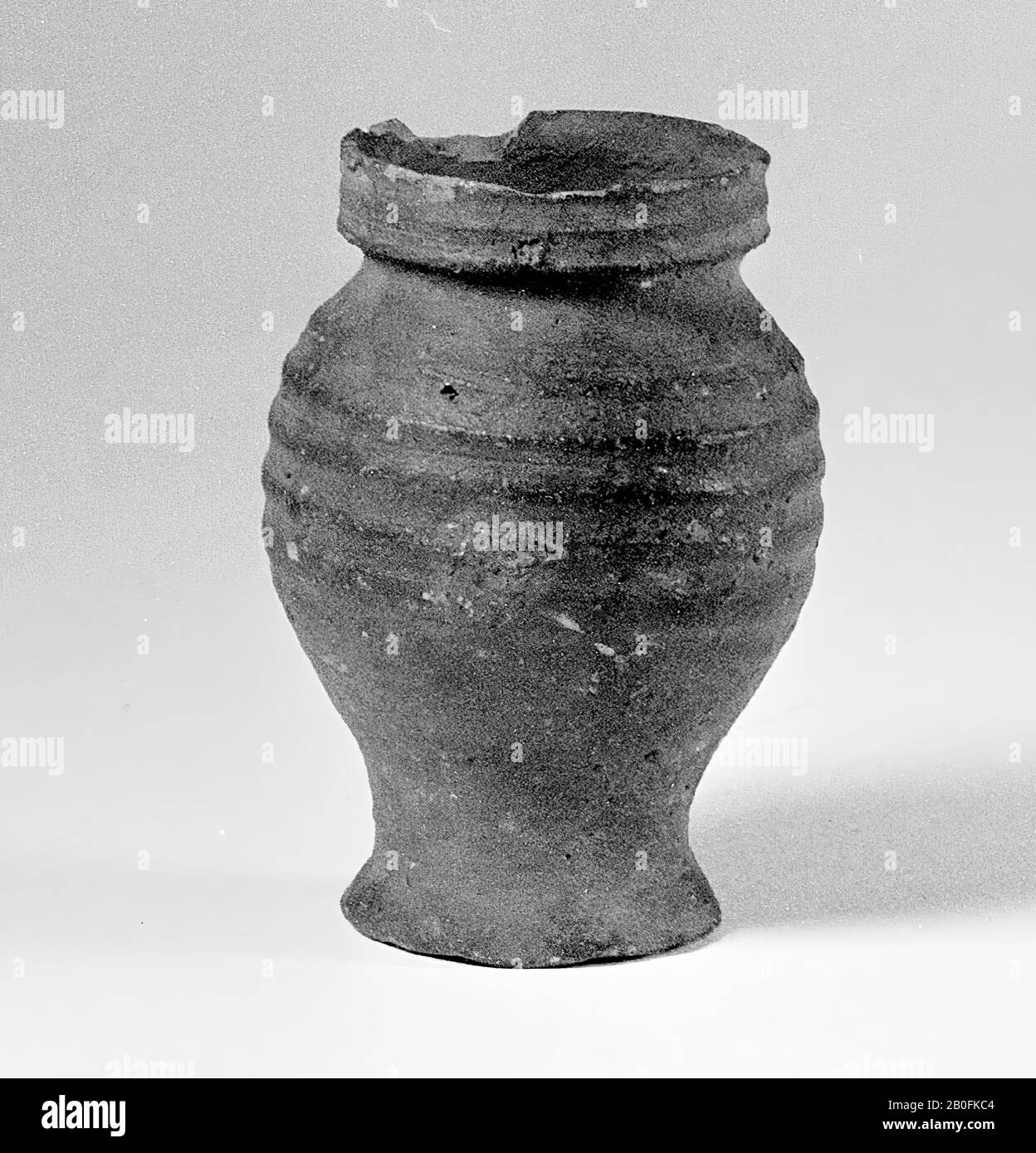 Pot, chips at the neck and foot, the belly decorated with ribs, pottery ...