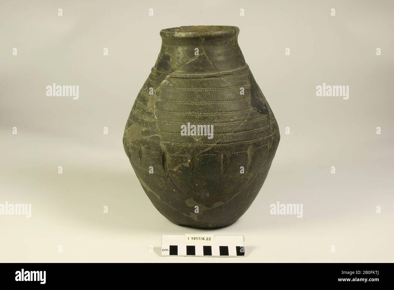 Convex, biconic pot with vertical indentations at the transition from ...