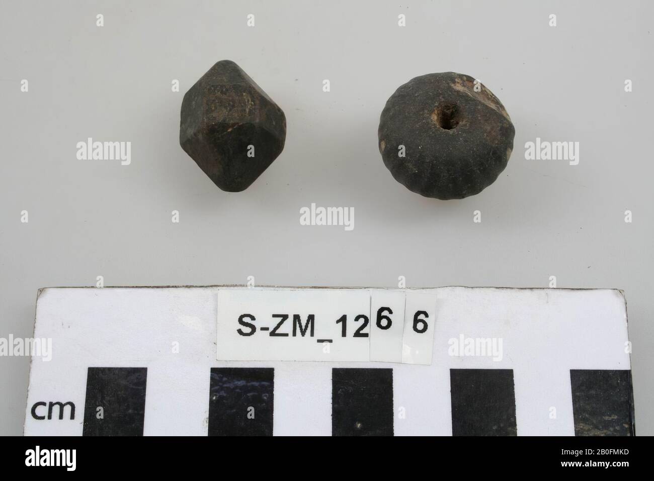 2 Weights: 1 weight and 1 weaving weight with piercing, weights ...