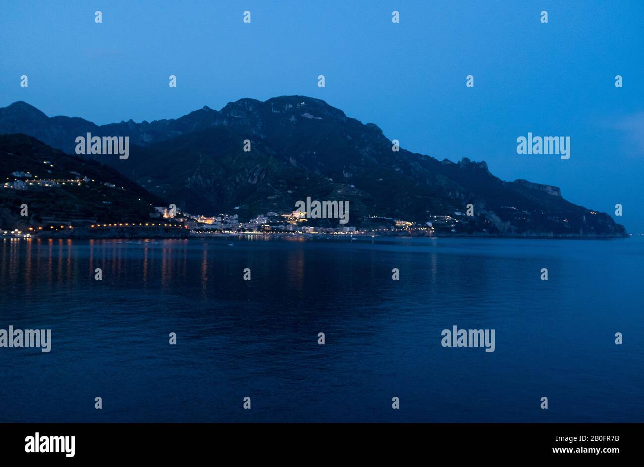 Blue hour on a summer night along the Italian Riviera of the Amalfi ...