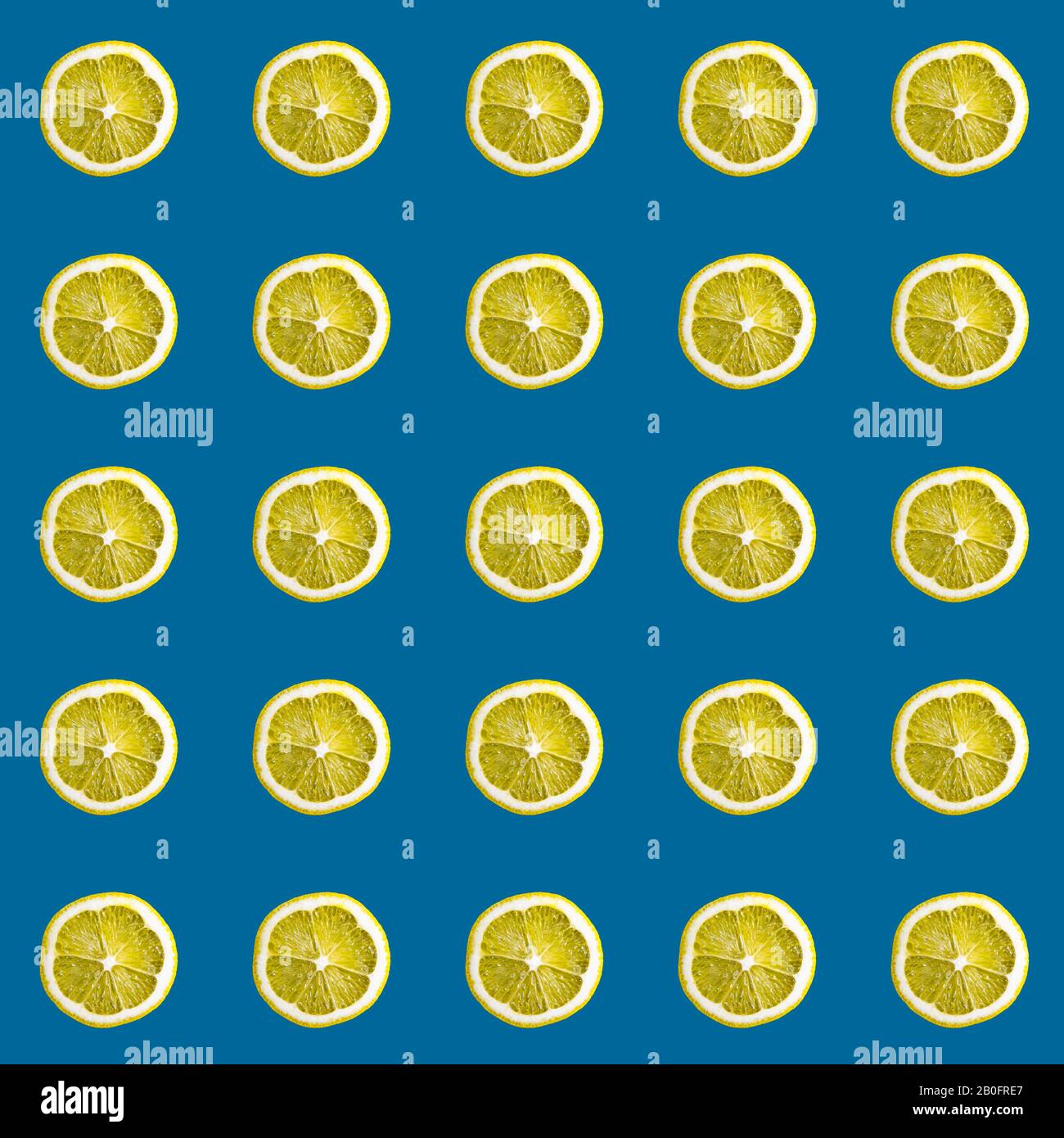 yellow lemon pattern on a classic blue background Stock Photo - Alamy