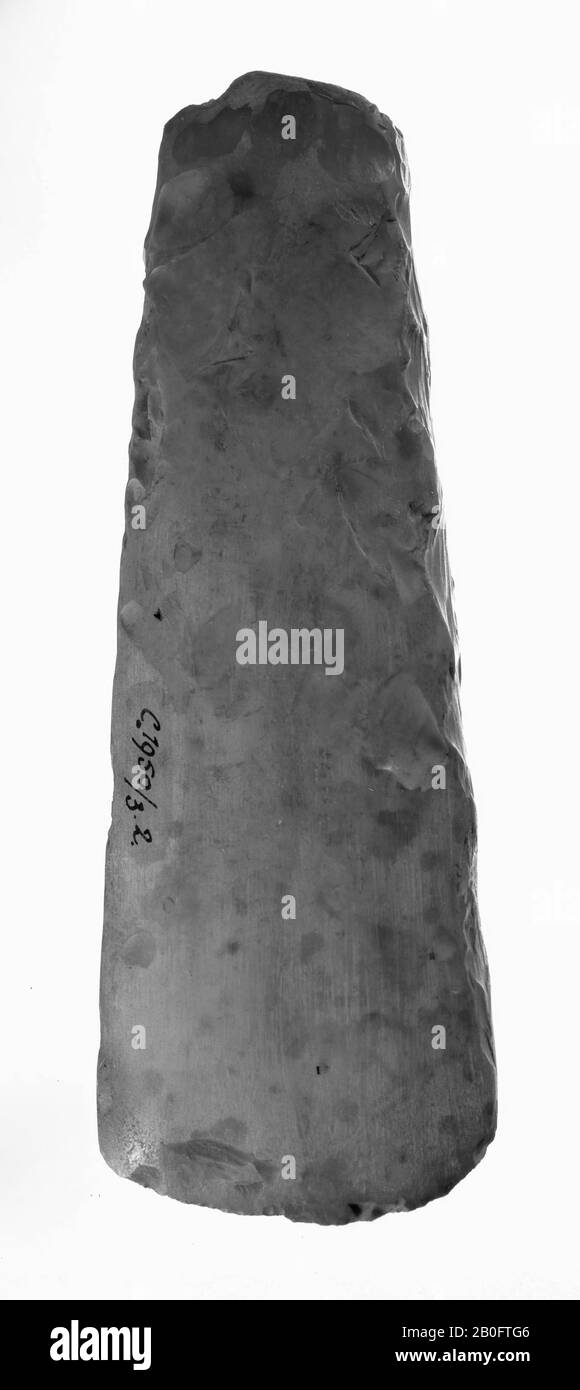 flint stones, with cut surfaces and sides. The cut is gouges shaped, ax ...