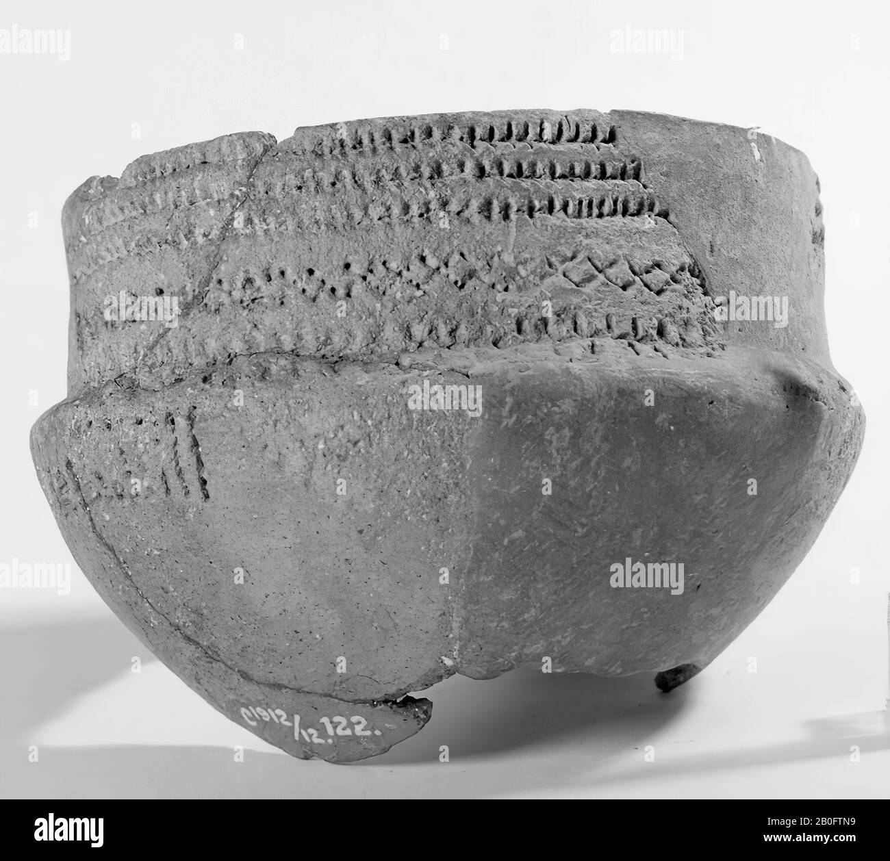 Large fragment of a pot of earthenware with slightly upright belly and ...