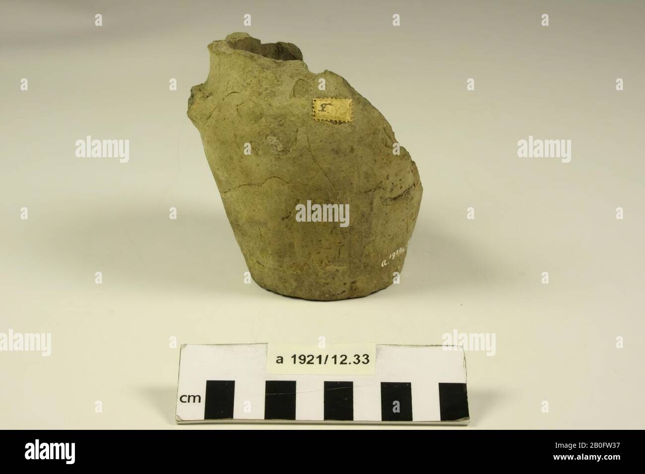 Pot of hand-formed earthenware. The edge and a large part of the wall ...