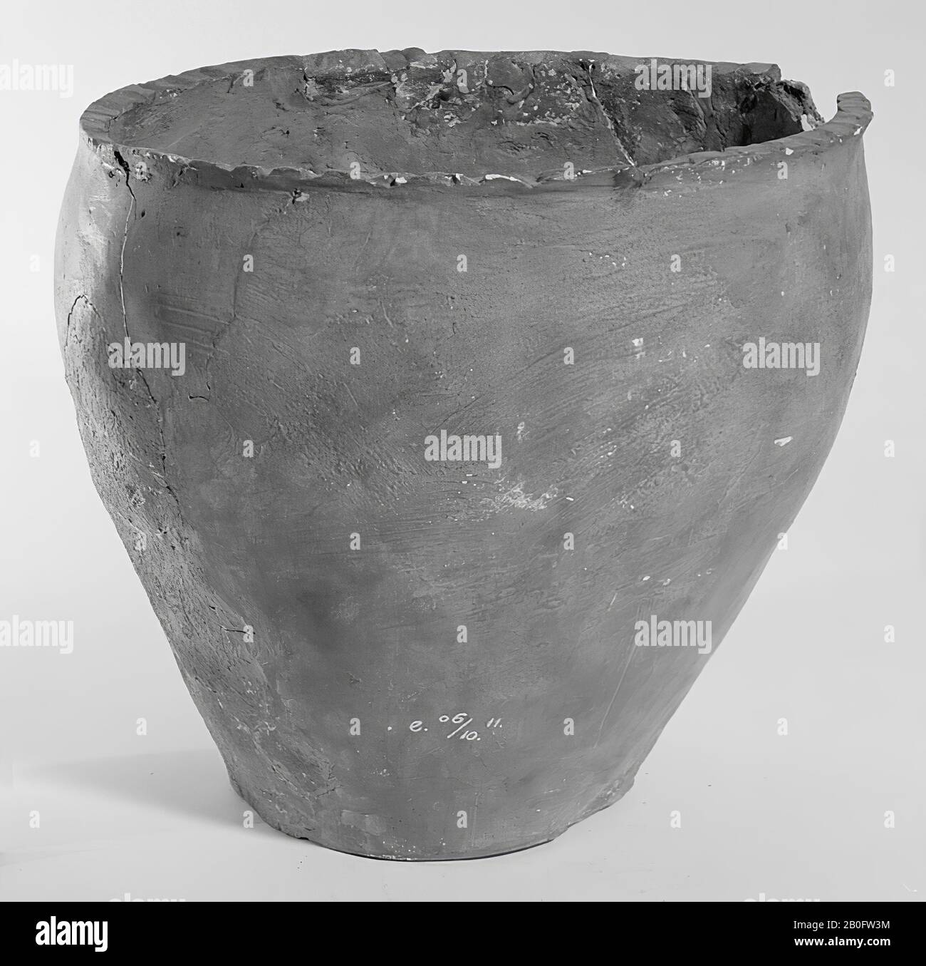 Cylindrical urn of earthenware with pressed edge, otherwise undecorated ...