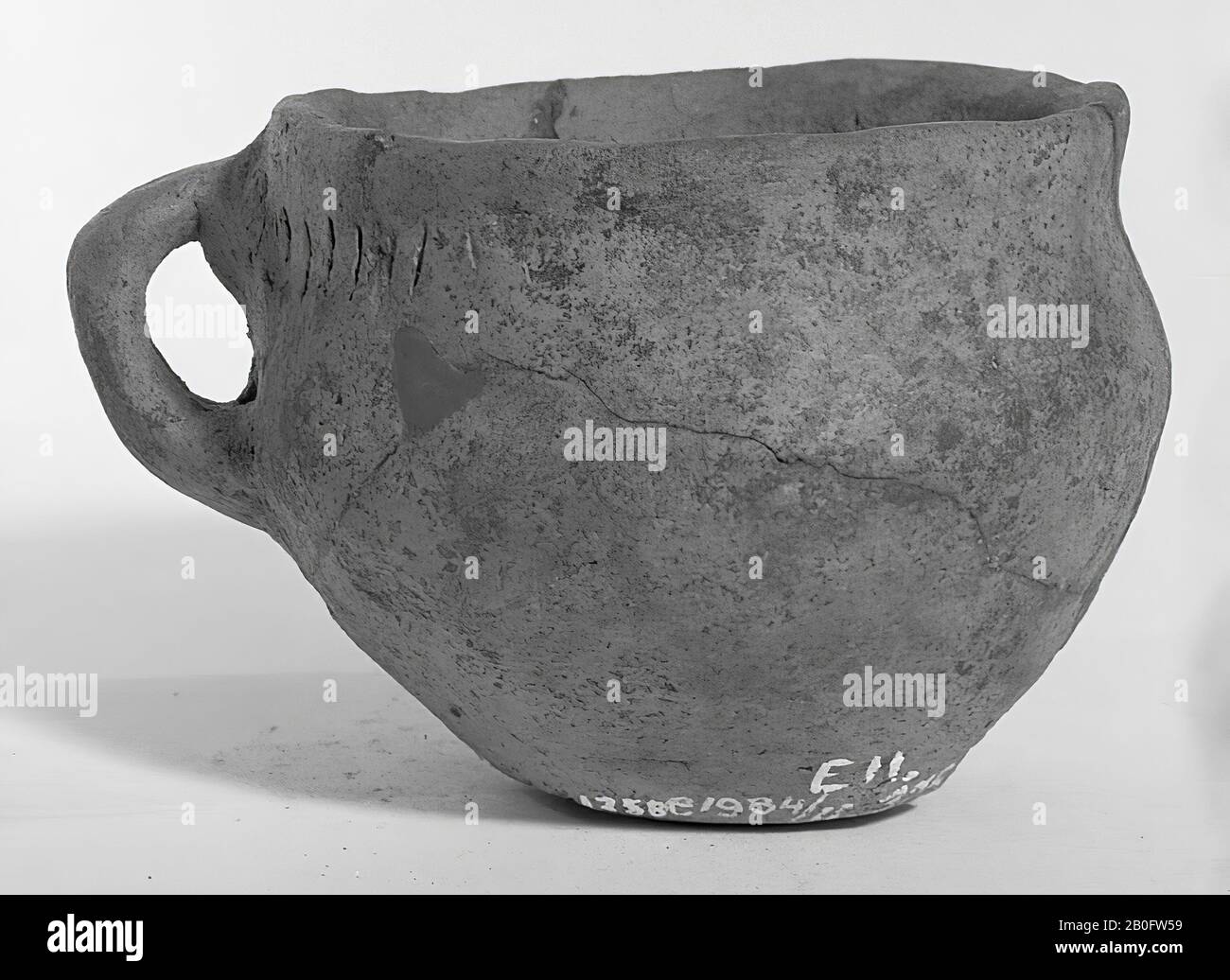 Small Germanic ear pot of earthenware. Some incisions at the ear. Old ...