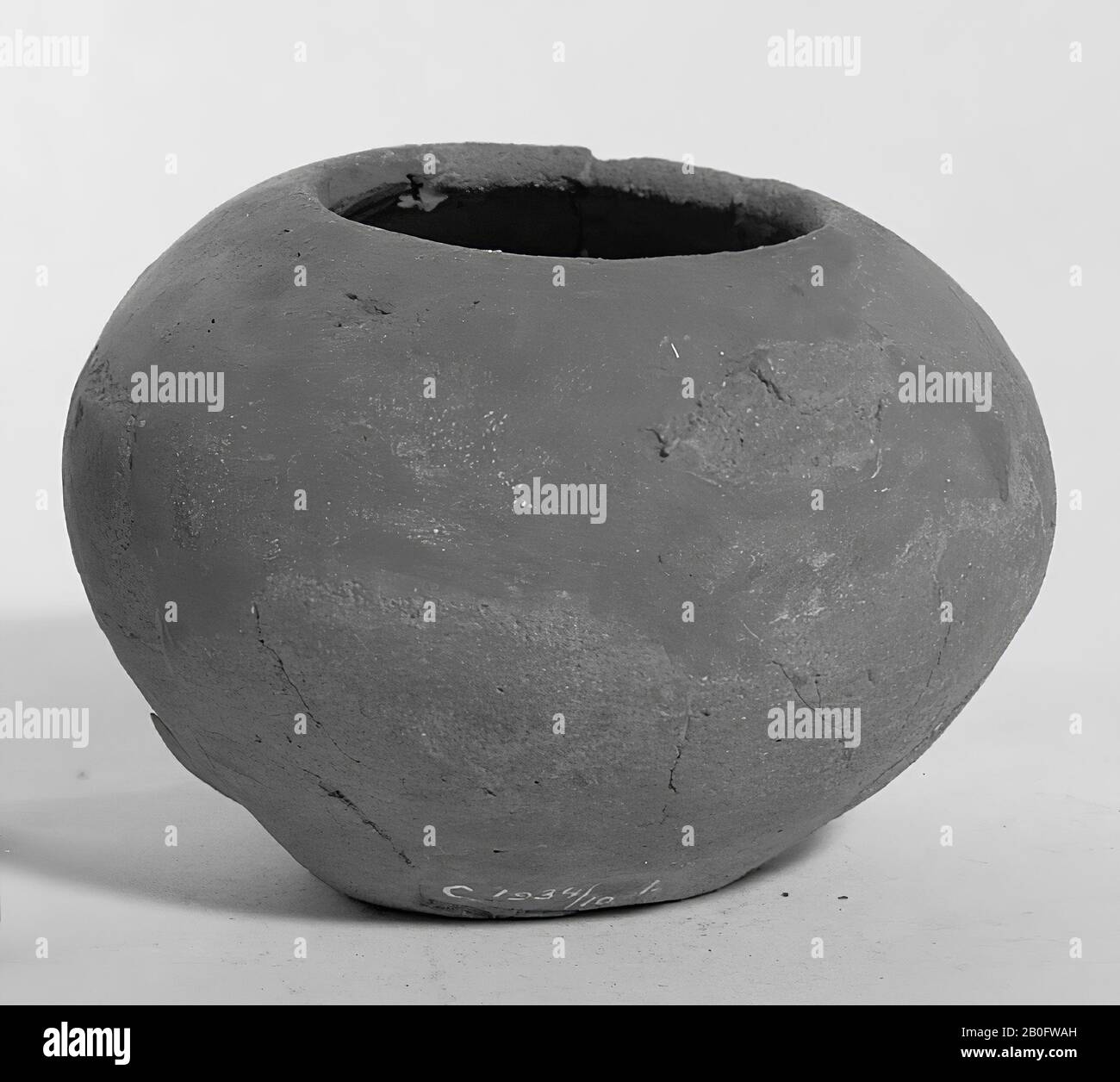 Small bulb pot of earthenware with narrow opening. Unstable old bonding ...