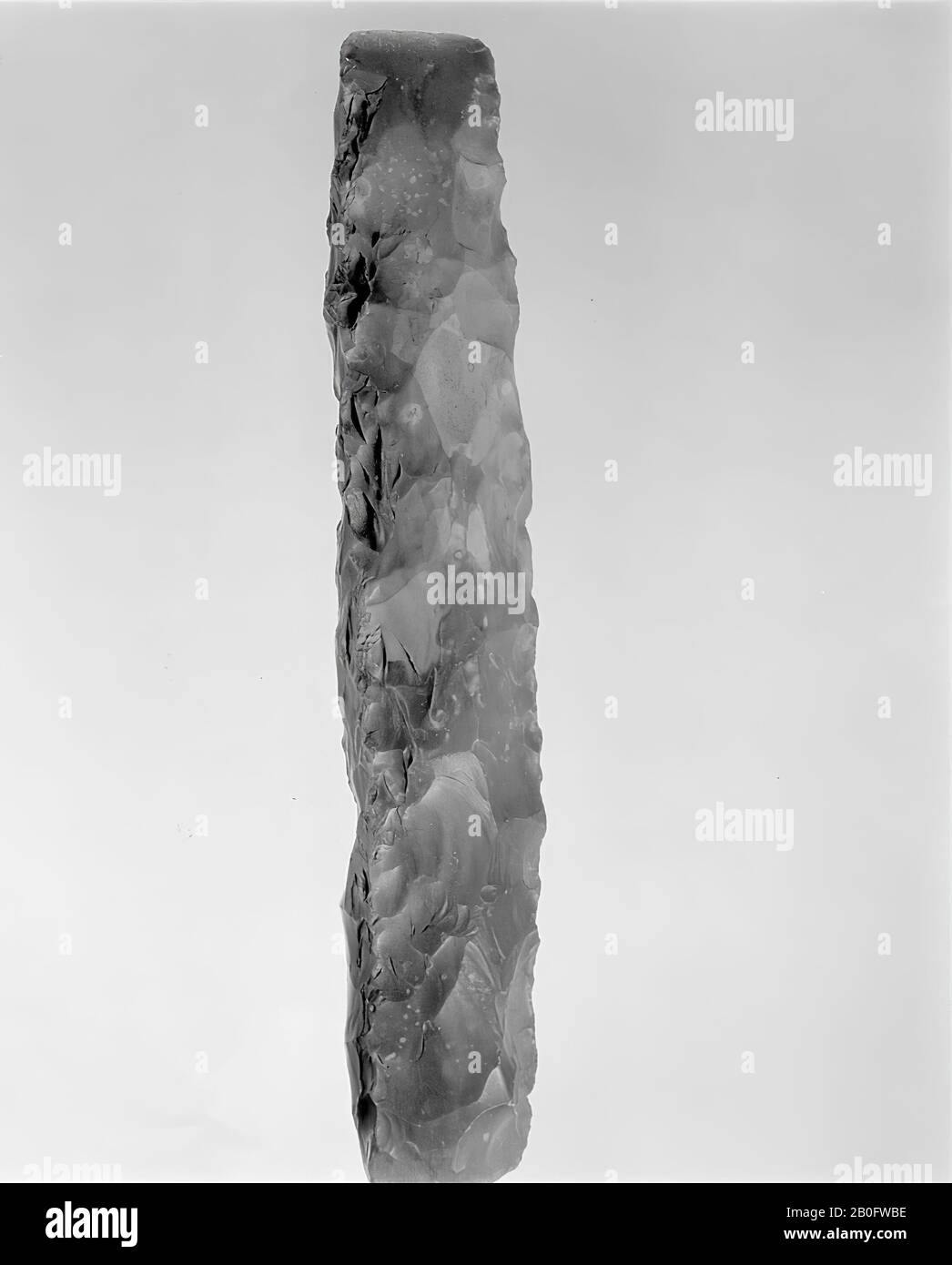 long and narrow chisel with broad top and rectangular cross section, of ...