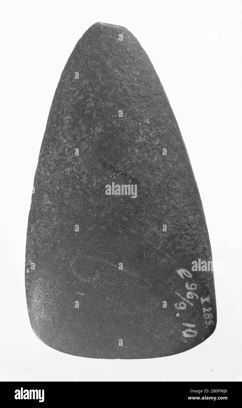 gray stone chisel, pointed at one end, sharp at the edge, ax, stone ...