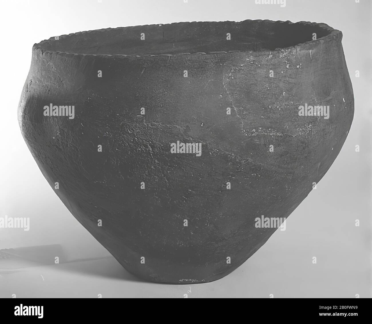 Plaster cast of a wide, rough-walled Germanic urn with faintly curved ...