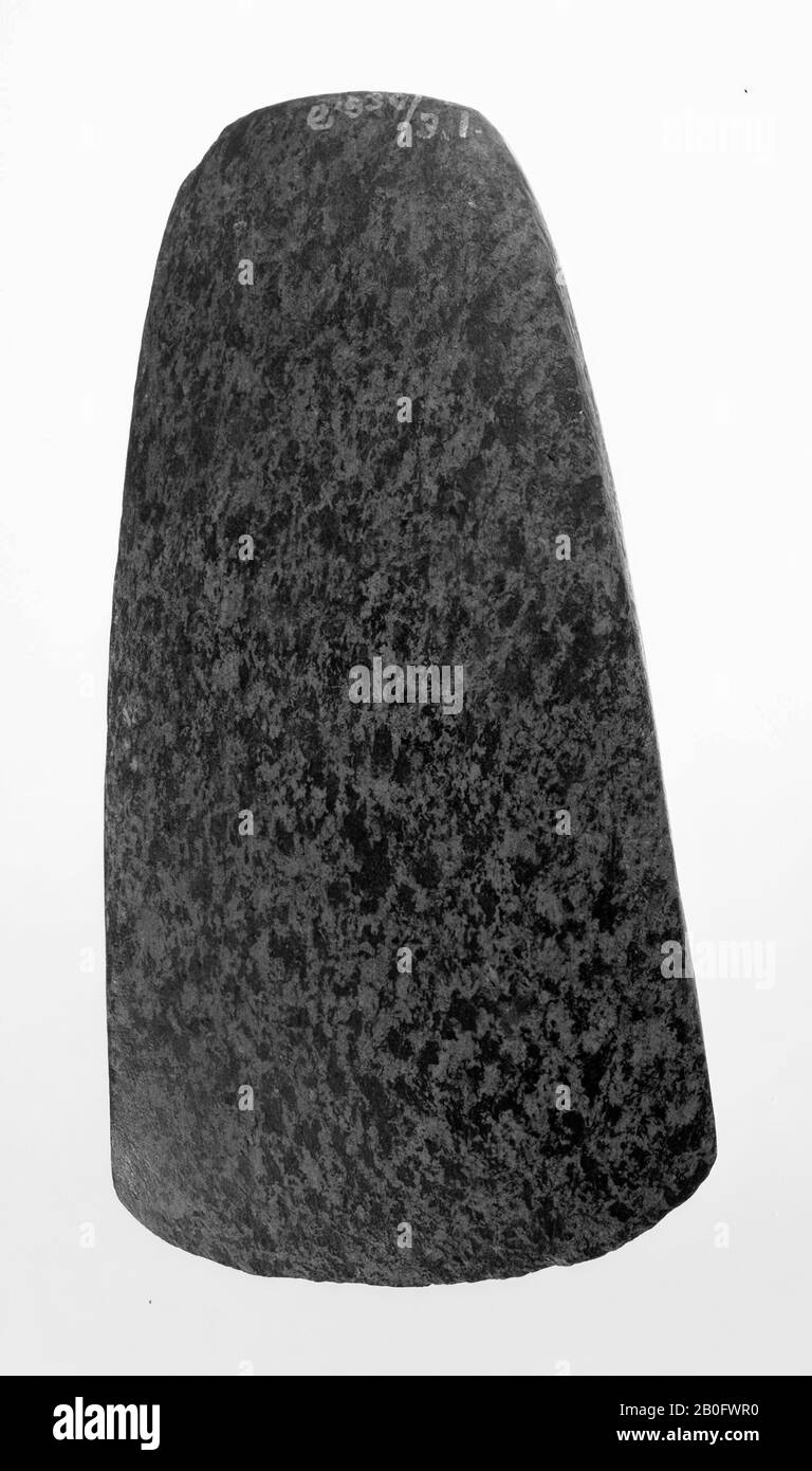 chisel of mottled rock with wide top and rectangular cross-section, ax ...