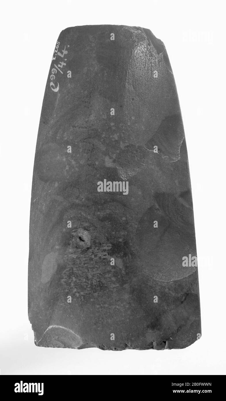 chisel of yellow-red flint. Upper part of a chisel, the lower part ...