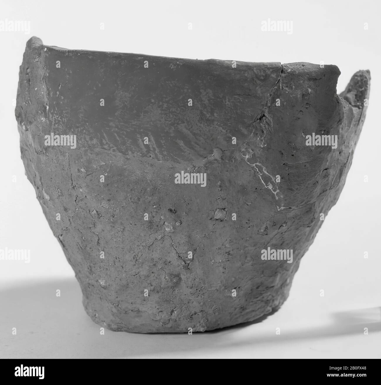 Fragment of a pottery pot. Part of the edge Stock Photo - Alamy