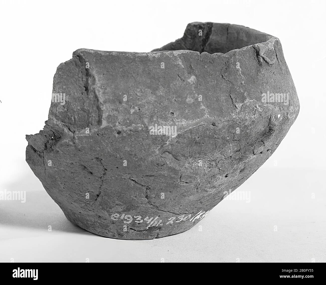 Fragment of a pottery of pottery. Unstable old bonding, large lacuna in ...