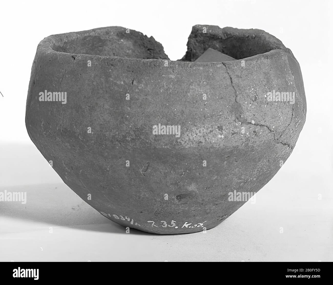 Pottery apiary. Old bondings and additions, the edge is damaged, lacuna ...