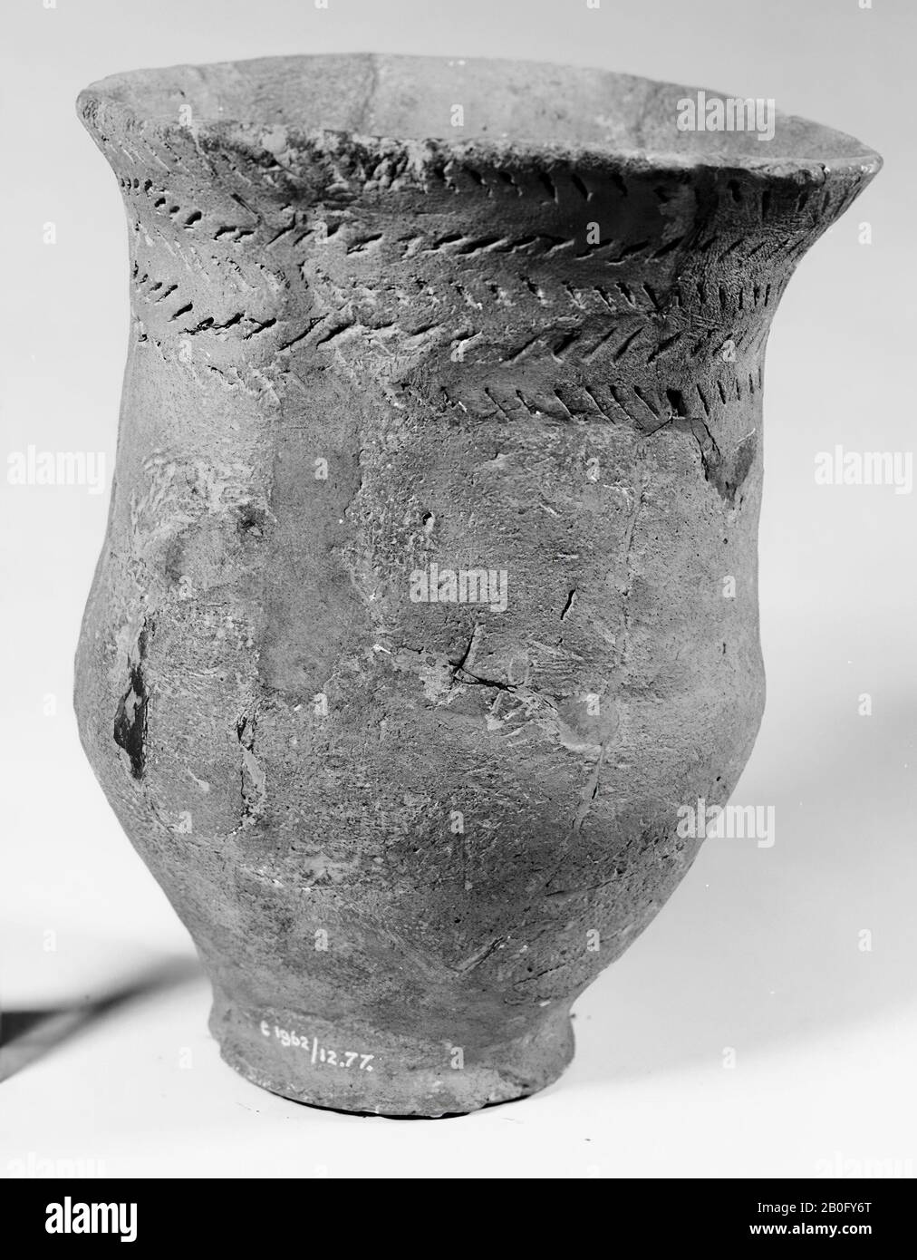 Stand foot cup with herringbone decoration on the top quarter. With old ...