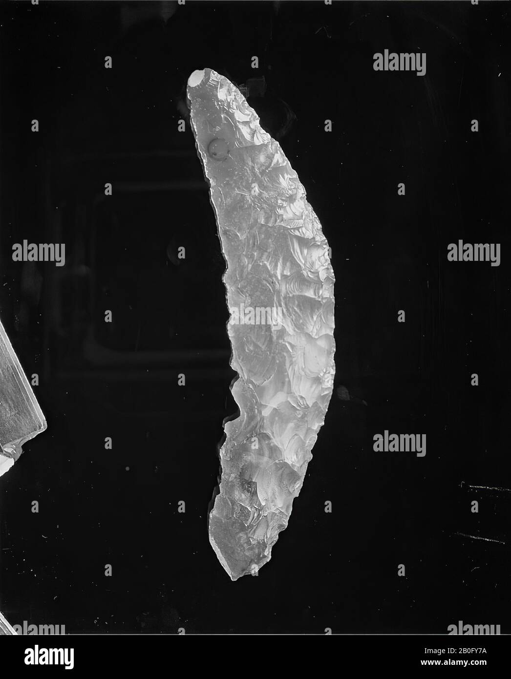 Sickle shaped flint tool hi-res stock photography and images - Alamy