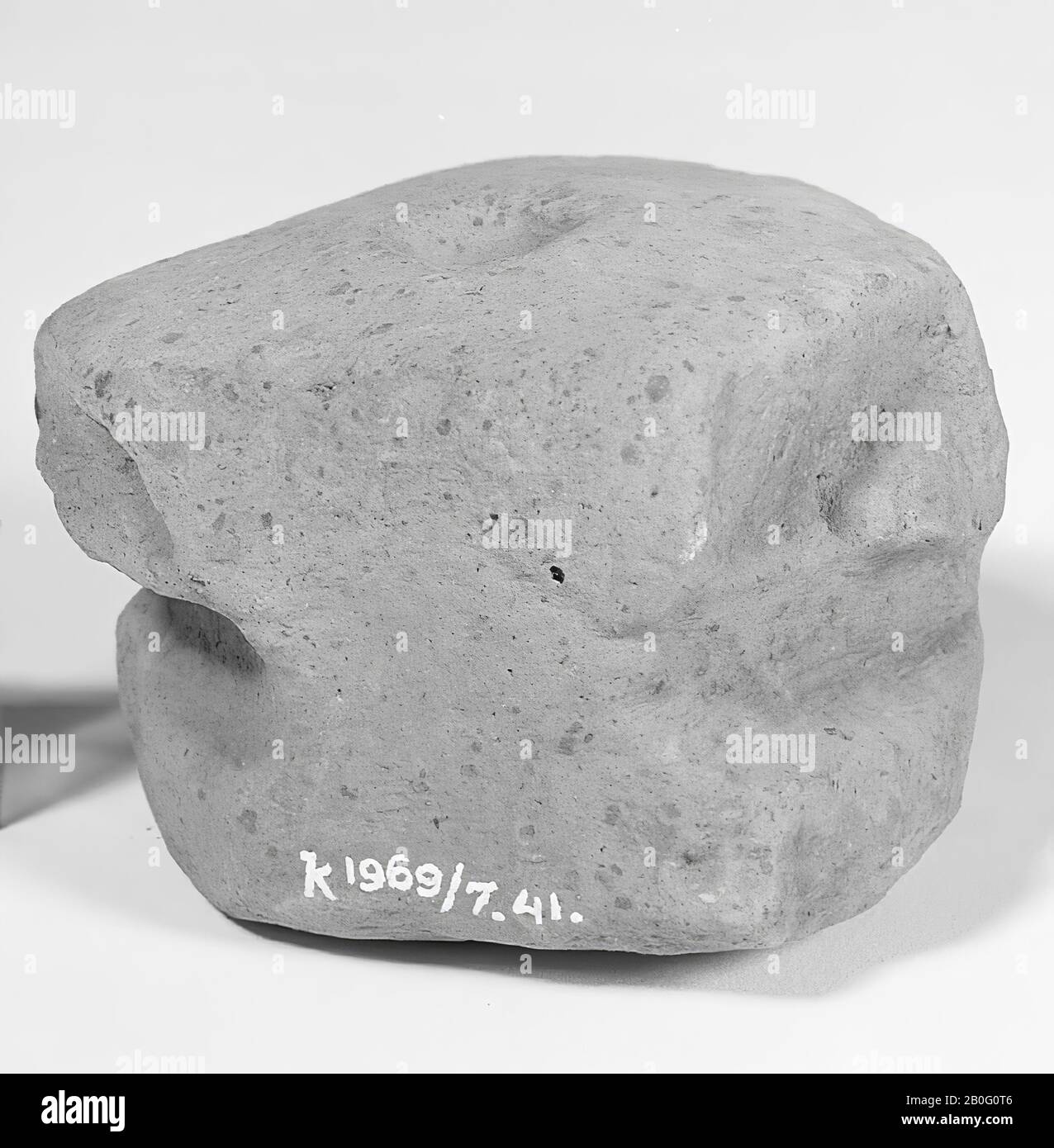 3-angled weight with broken corner. 3x11 base pierced., Red baked ...