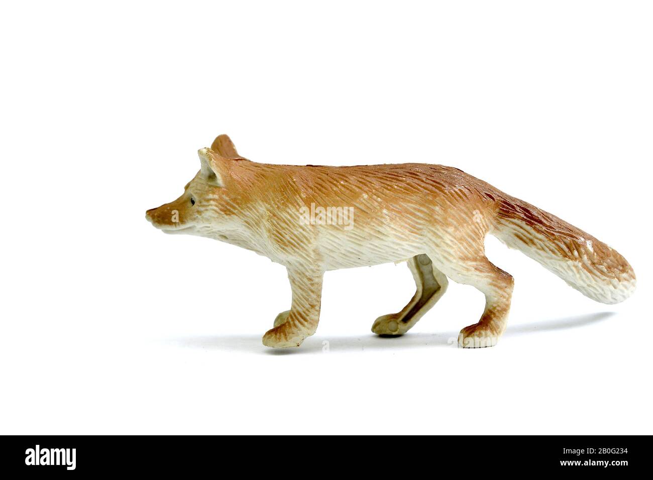 plastic wolf figurine toy on white background Stock Photo - Alamy