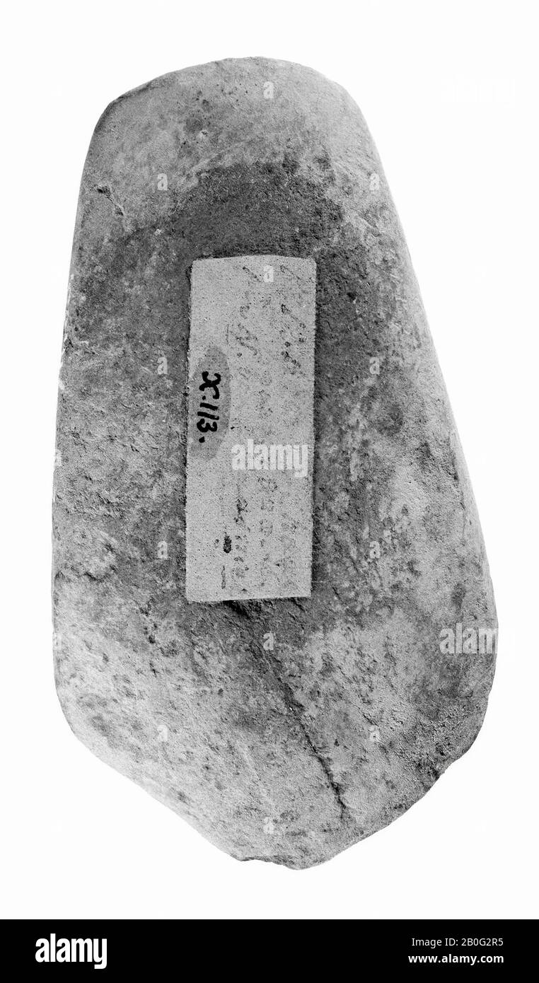 ax with oval cross-section and straight sides. Made from alkali basalt ...