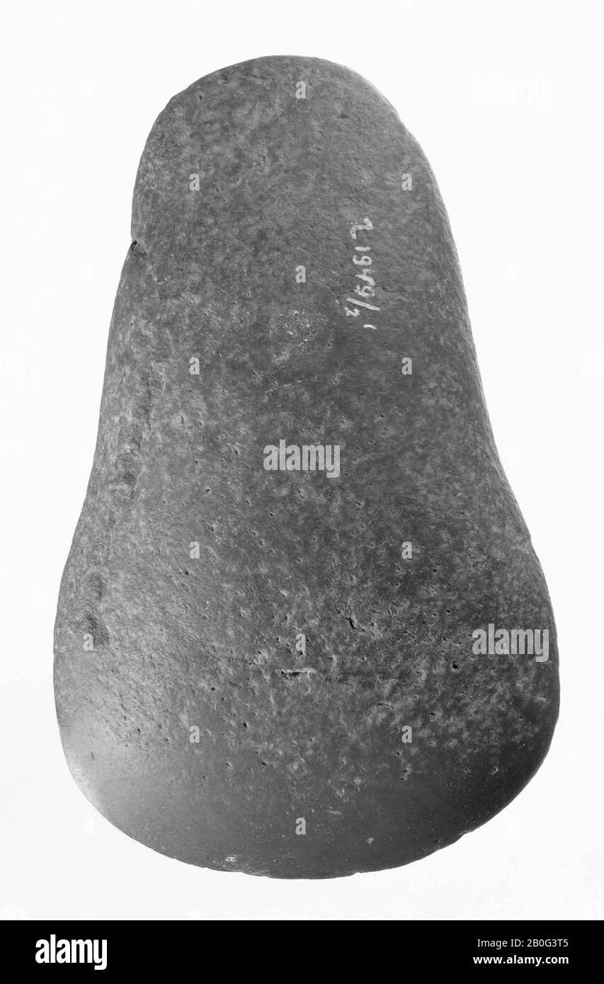 sharpened ax of gray-brown quartzite with an oval cross-section ...