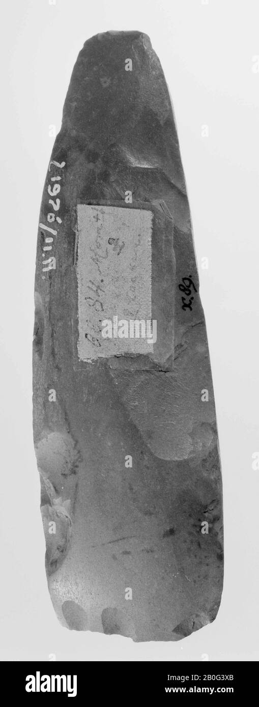 flint ax, long and narrow, with oval cross-section. Finely ground and ...