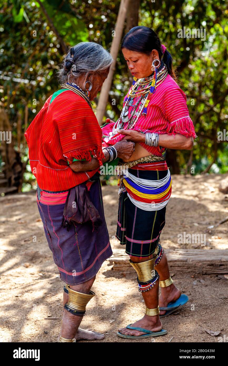 A Young Woman From The Kayaw Ethnic Group Giving Food To An Elderly ...
