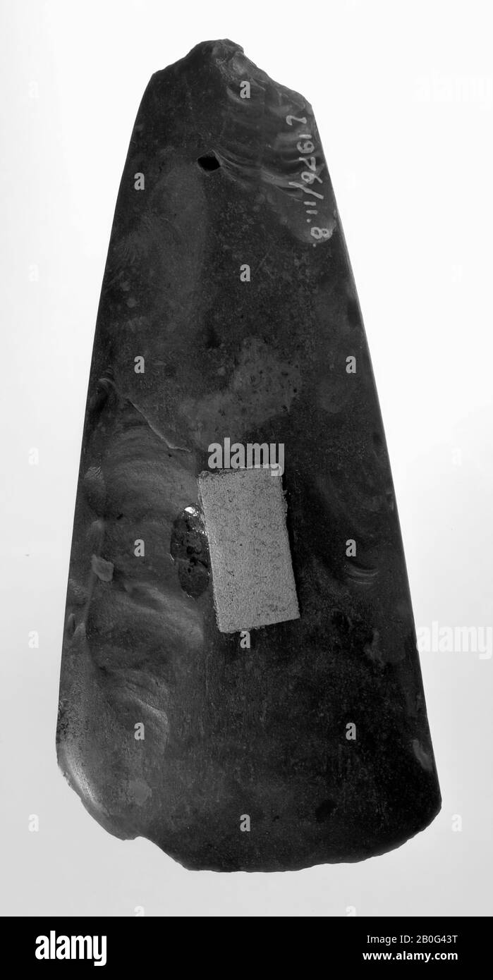 flint ax, with oval cross-section and three longitudinal facets on one ...