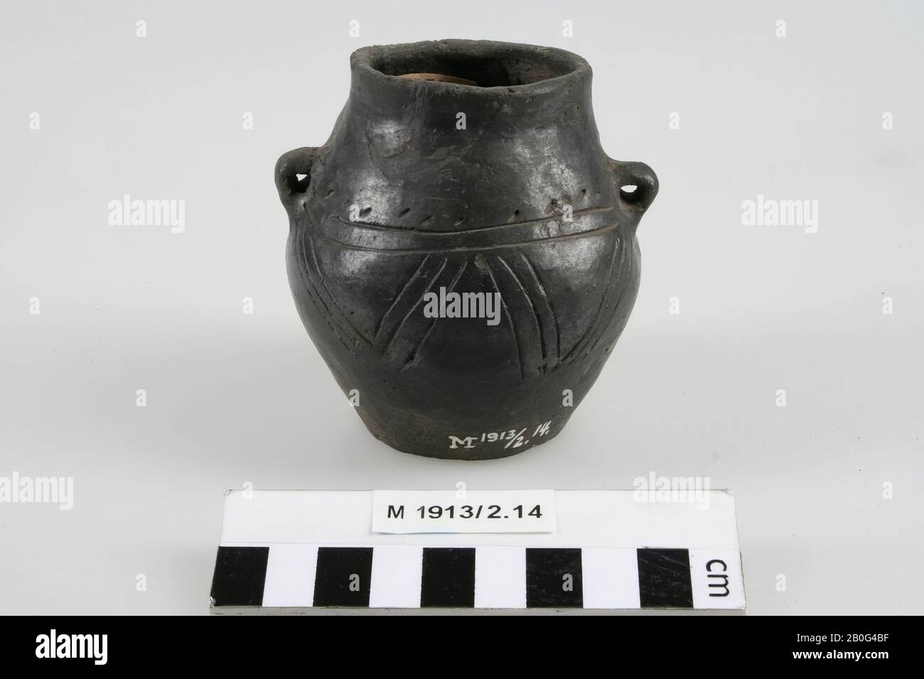 Pot with 2 ears and carved decoration. Old gluing and filling., Pottery ...